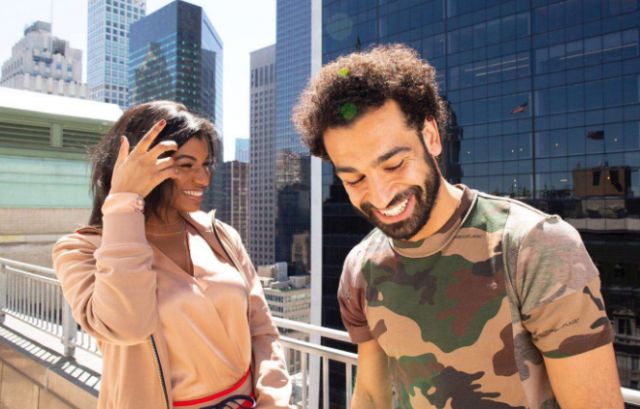 Mohamed Salah with lady who looks like Marcus Rashford