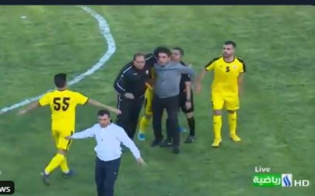 Video: Fans break into stadium in Iraq to attack the ref