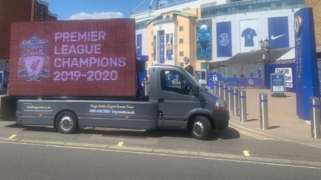 Liverpool hire champions van outside Chelsea stadium