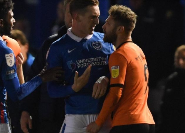 Photo: Matty Taylor grabs Ronal Curtis' genitals Oxford vs Portsmouth