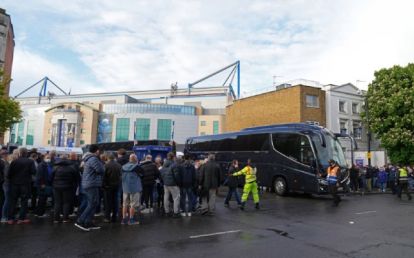 Chelsea team bus held up by stewards eating ice cream