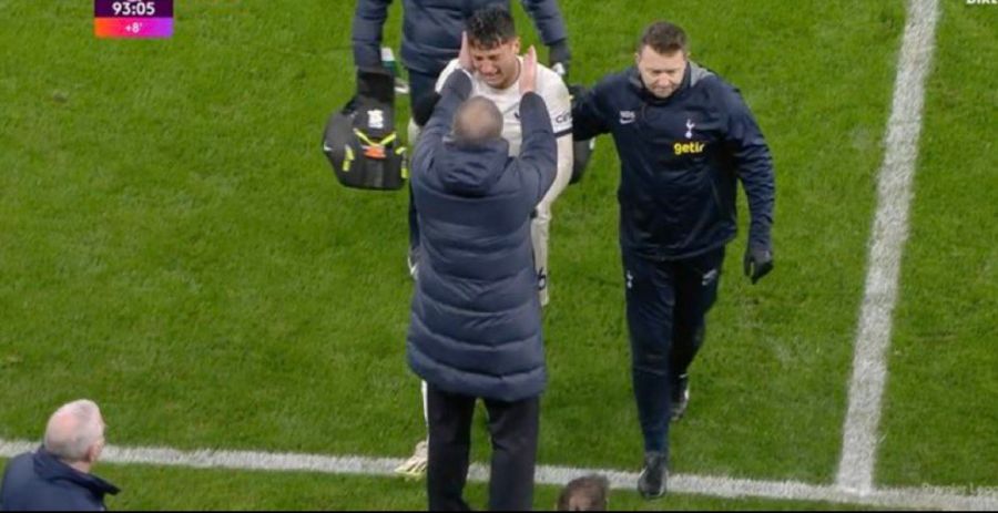 Tottenham ace was seen leaving the stadium on crutches with a leg brace ...