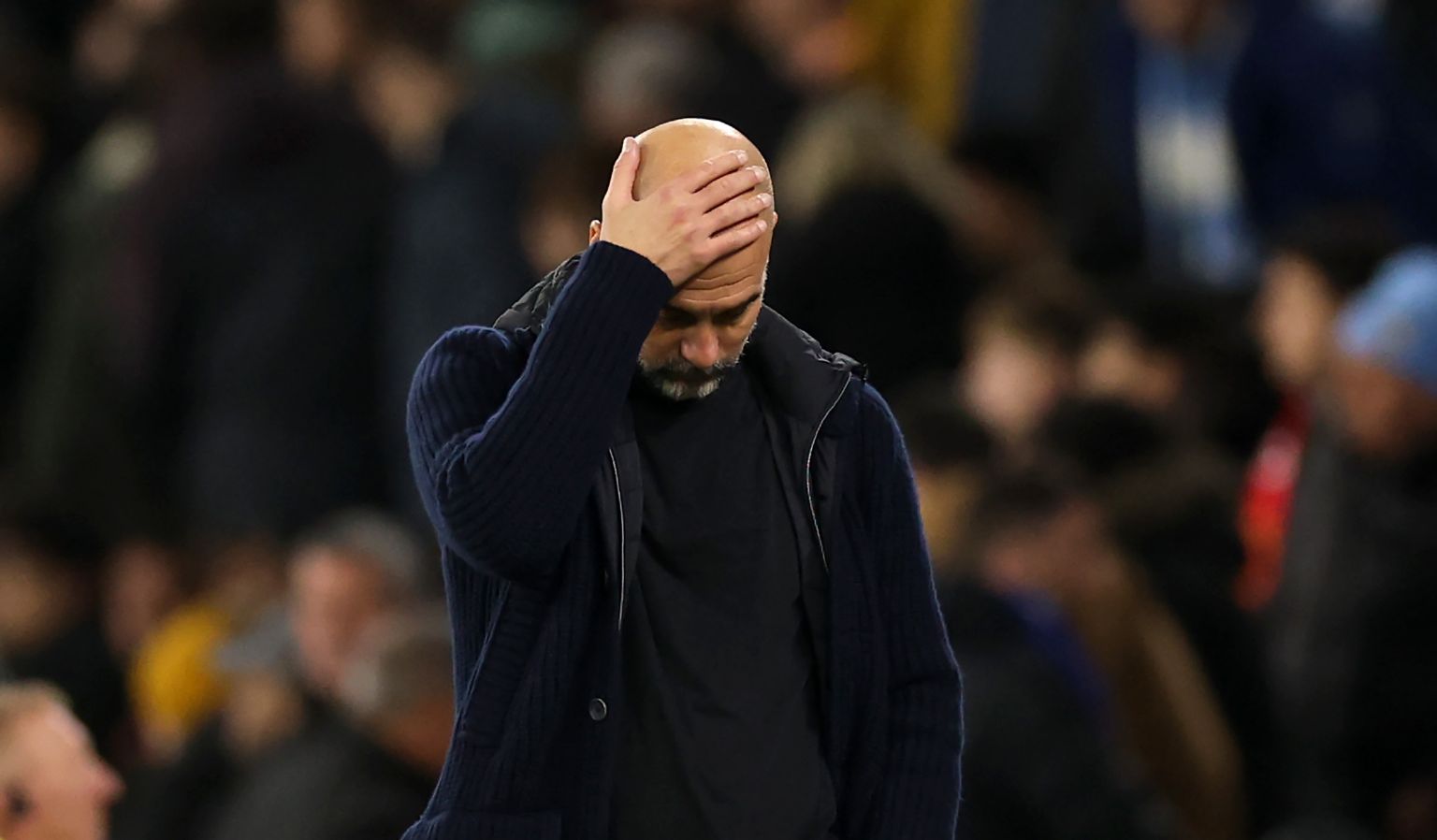 Pep Guardiola appears to scratch himself again after Manchester derby