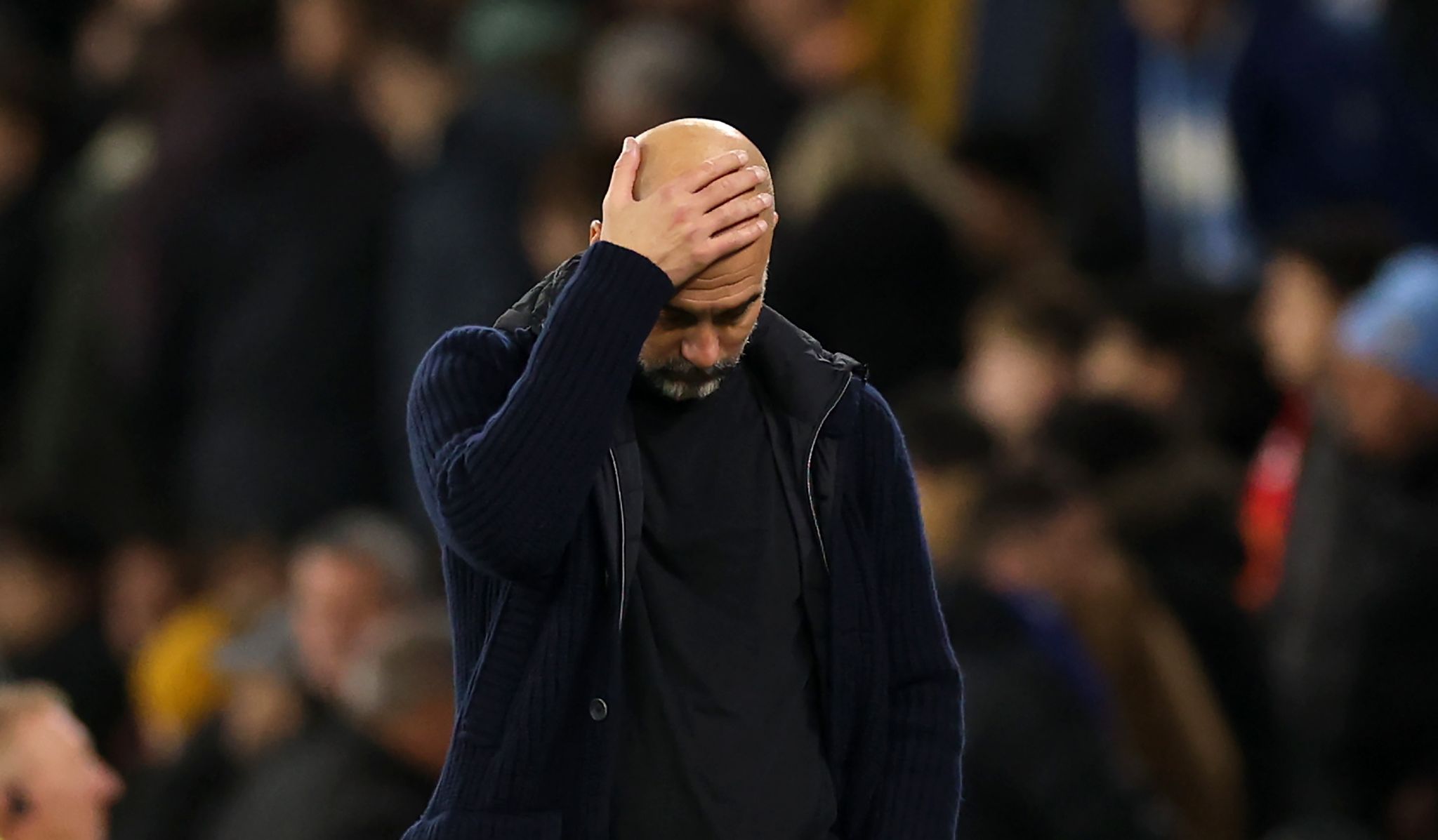 Pep Guardiola appears to scratch himself again after Manchester derby